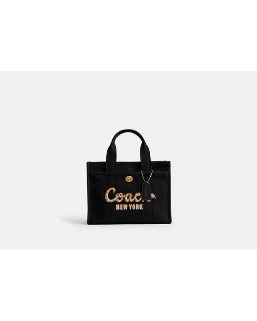 COACH New Year Cargo Tote Bag 26 With Coach Snake Script in Black | Lyst UK