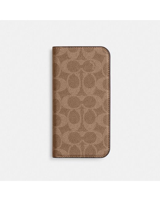 COACH Iphone 16 Pro Folio In Signature Canvas in Brown | Lyst