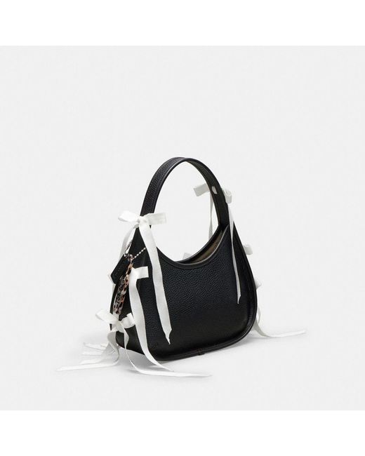COACH Ergo Bag In Topia Leather With Allover Bows in Black | Lyst