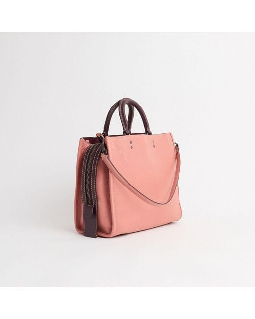 COACH Restored Rogue in Pink | Lyst