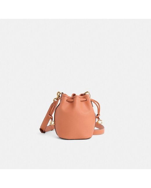 COACH Restored Camila Bucket Bag in Orange | Lyst