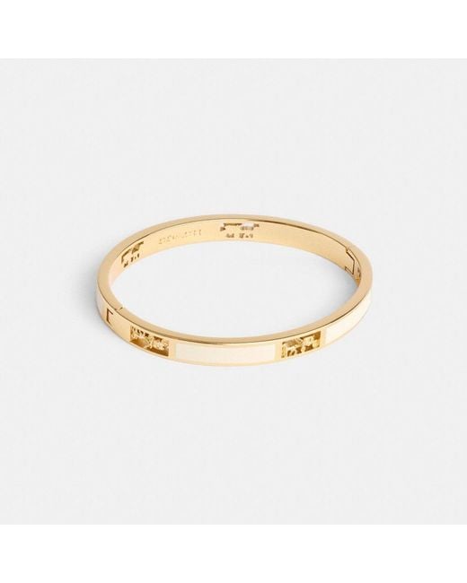 COACH Horse And Carriage Cut Out Enamel Bangle in Metallic | Lyst