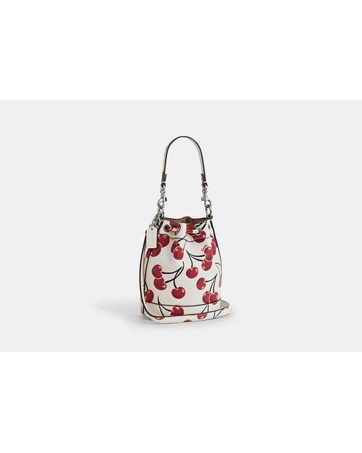 COACH Mini Bucket Bag With Cherry Print in Black | Lyst