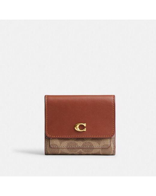 COACH Mila Small Flap Wallet In Signature Canvas in Brown | Lyst