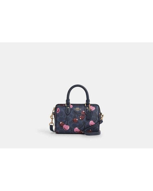 COACH Mini Rowan Crossbody Bag In Signature Canvas With Cherry Print in Black | Lyst