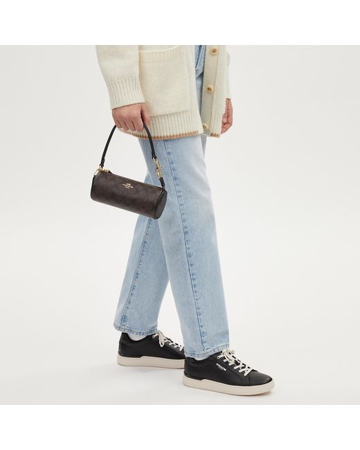 COACH Nolita Barrel Bag In Signature Canvas in Black | Lyst