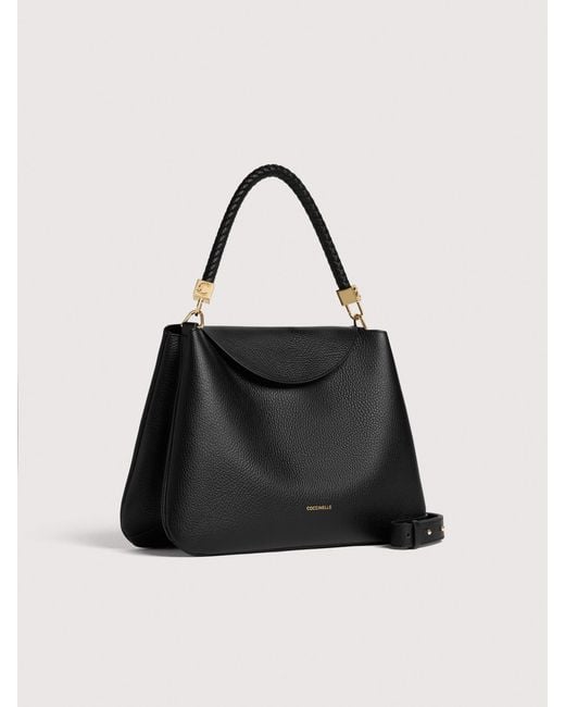 Coccinelle Grained Leather Handbag Tiggy Medium in Black | Lyst UK