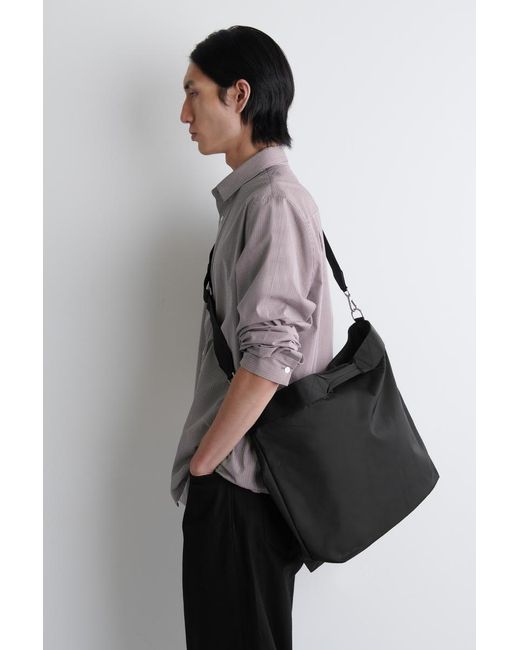 COS Pursuit Messenger Bag in Black for Men | Lyst