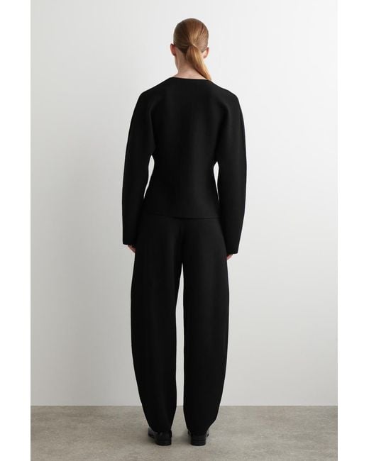 COS Knitted Wool Barrel-Leg Trousers in Black | Lyst UK