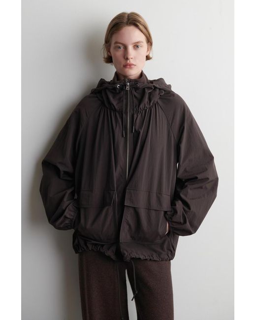 COS Technical Hooded Parka Jacket in Black | Lyst UK