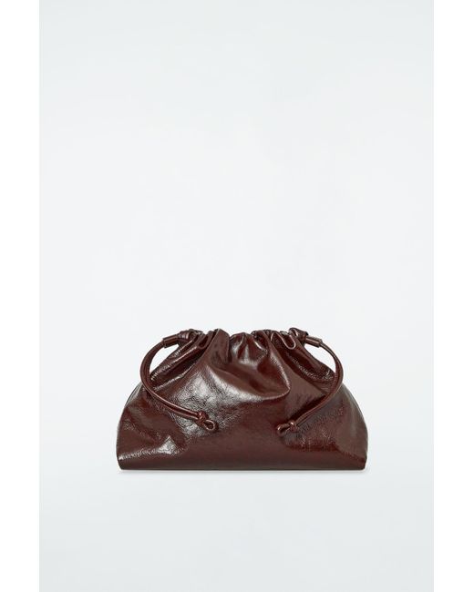 COS Mini Cavatelli Clutch - Leather in Brown | Lyst