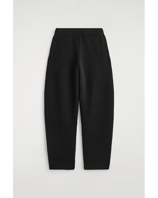 COS Knitted Wool Barrel-Leg Trousers in Black | Lyst UK