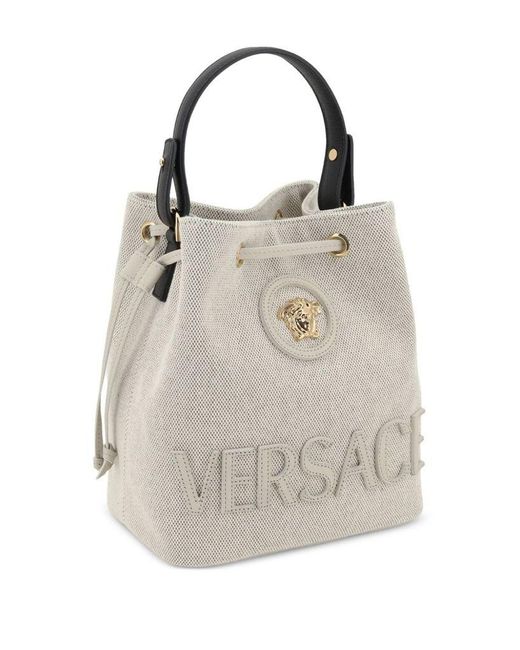Versace Medusa Bucket Bag in Natural | Lyst