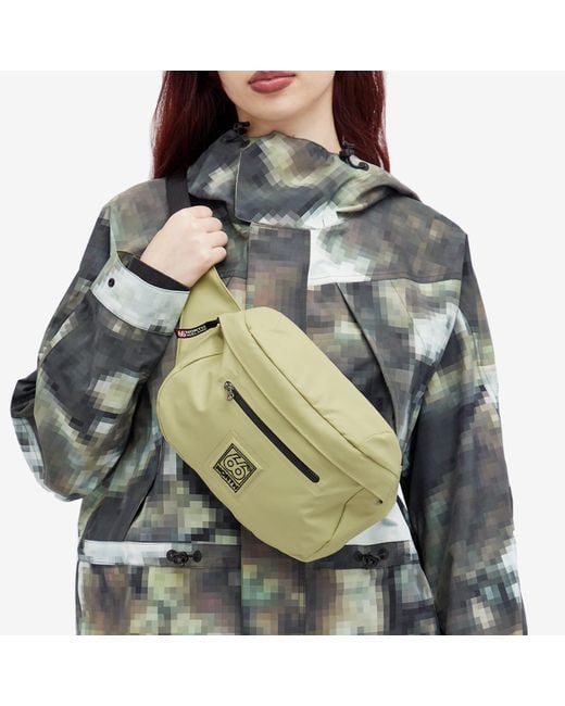 66 North Cross Body Bag in Green | Lyst
