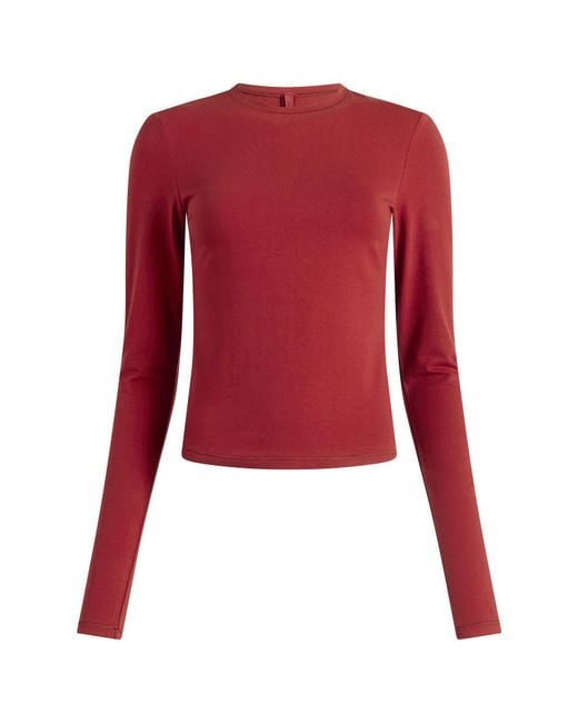 Skims Cotton Jersey Long Sleeve Top in Red | Lyst UK
