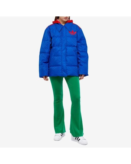 adidas Adicolor 70s Monogram Puffer Jacket in Blue | Lyst UK