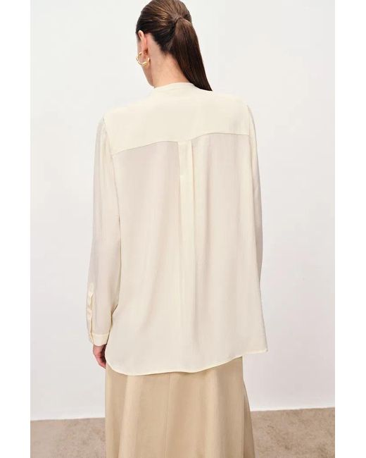 Fabrique Linde Ribbon Tie Flowy Blouse in Natural | Lyst UK