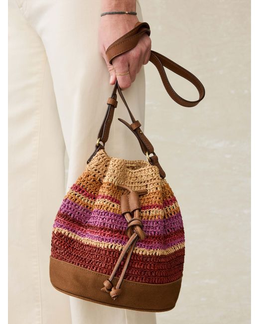 Faherty Striped Raffia Drawstring Bucket Bag in Red | Lyst