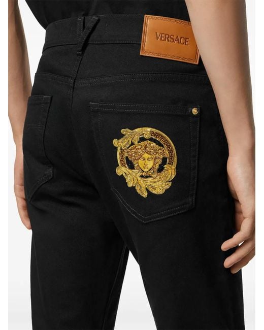 Versace Medusa-Embroidery Jeans in Black for Men | Lyst UK