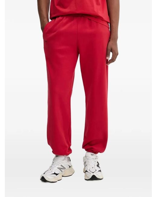 PANGAIA Logo-Print Cuffed Track Pants in Red | Lyst UK