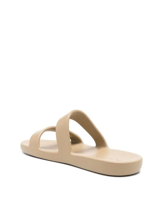 The Row Rubber Slides in Natural | Lyst