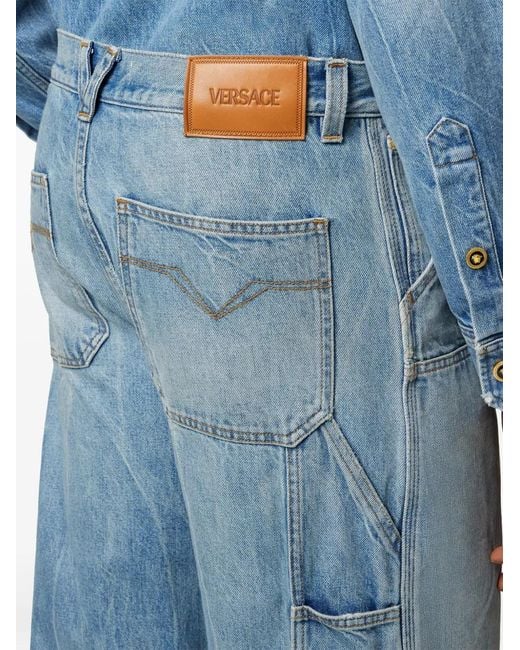 Versace Carpenter Utility-Pocket Jeans in Blue for Men | Lyst UK