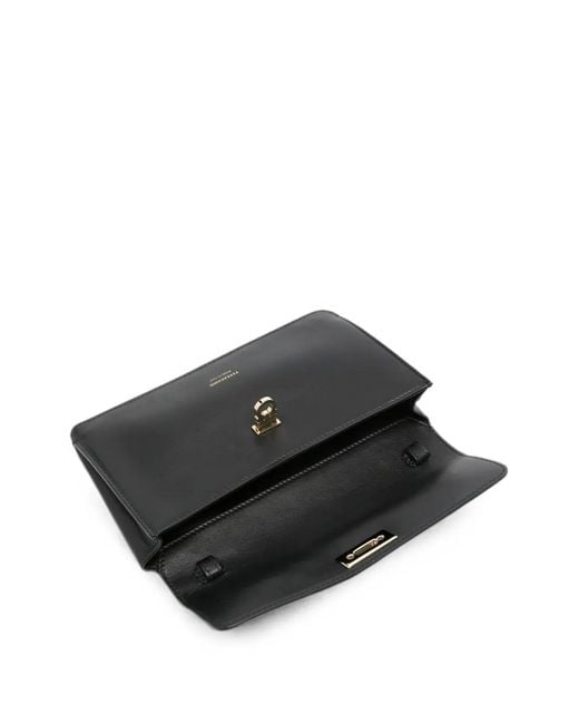Ferragamo Gancini Logo-Detail Clutch Bag in Black | Lyst UK