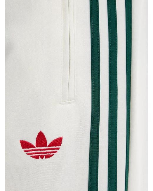 adidas Firebird Stripe Logo Track Pants in White for Men | Lyst UK