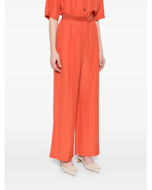 Tela Lomi Trousers in Red | Lyst