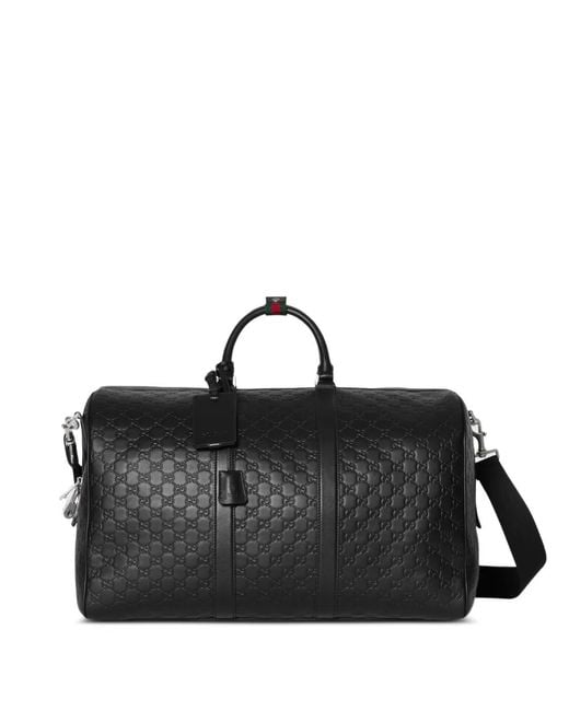 Gucci Gg-Motif Duffle Bag in Black | Lyst UK