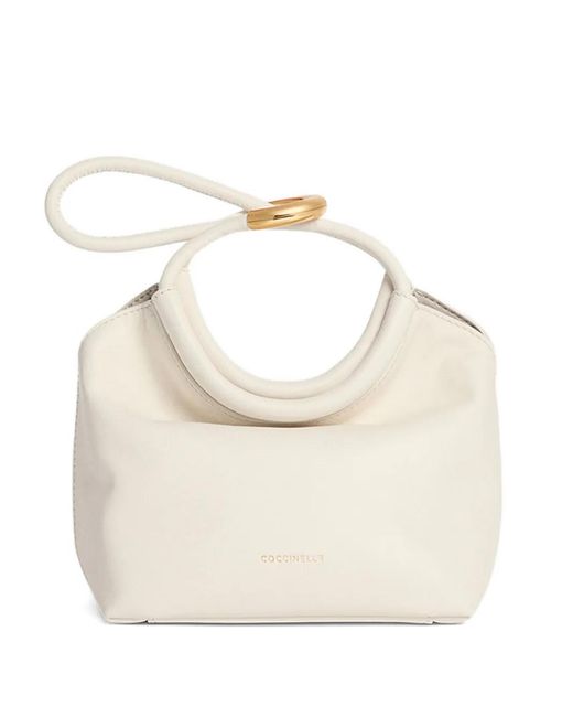 Coccinelle Mini Finn Shoulder Bag in White | Lyst UK