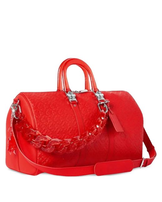 GUAPI Monogram Duffle Bag in Red | Lyst
