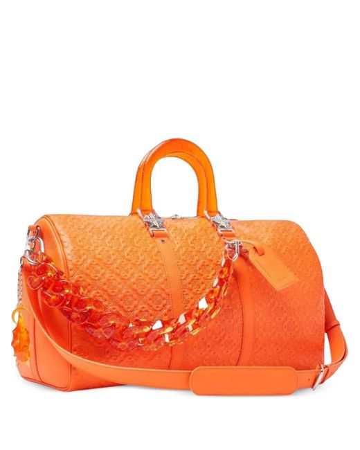 GUAPI Monogram Duffle Bag in Orange | Lyst