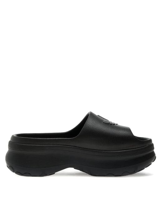 adidas Adifom Stan Logo-Embossed Platform Slides in Black | Lyst UK