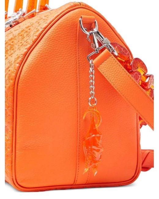 GUAPI Monogram Duffle Bag in Orange | Lyst