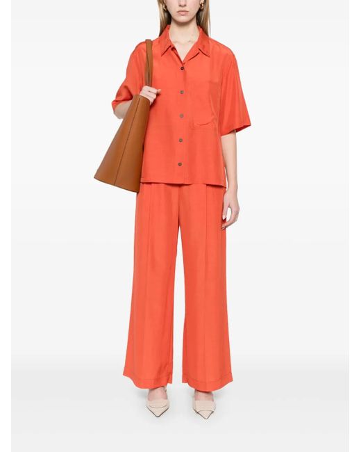 Tela Lomi Trousers in Red | Lyst