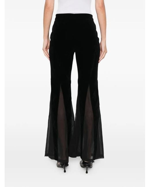 Never Fully Dressed Velvet Flared Trousers in Black | Lyst UK