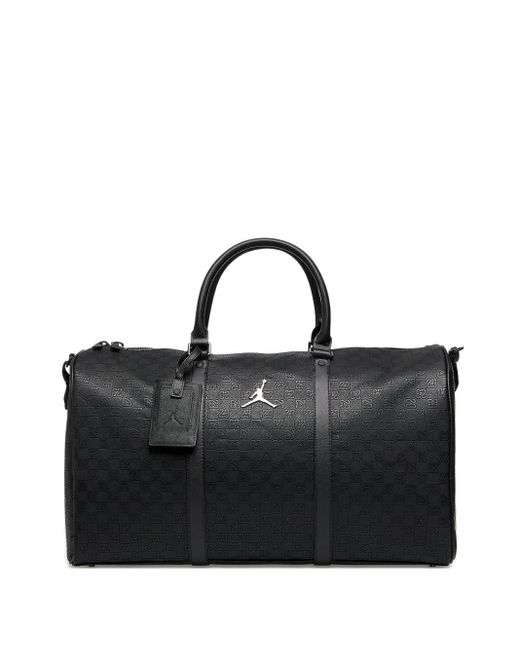 Nike Monogram Embossed Duffle Bag in Black | Lyst UK
