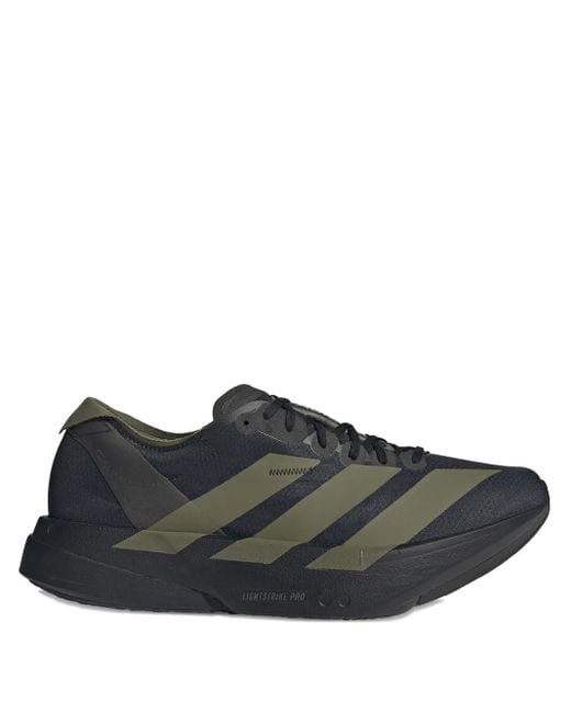 adidas Three-Striped Sneakers in Black | Lyst UK