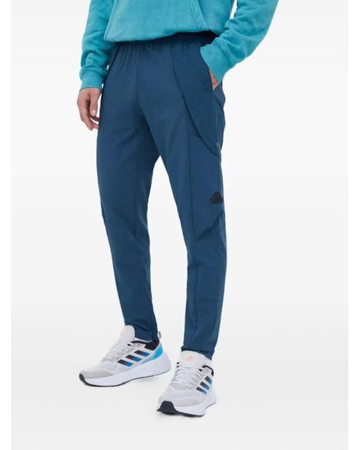 adidas Zip-Ankle Track Pants in Blue for Men | Lyst UK