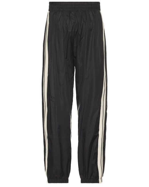 Palm Angels Curved Logo Nylon Track Pants in Black for Men | Lyst