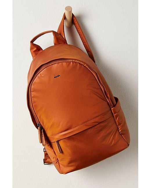 CARAA Stratus Medium Backpack in Orange | Lyst