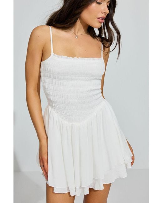 Garage Kenzie Smocked Tiered Romper in White | Lyst