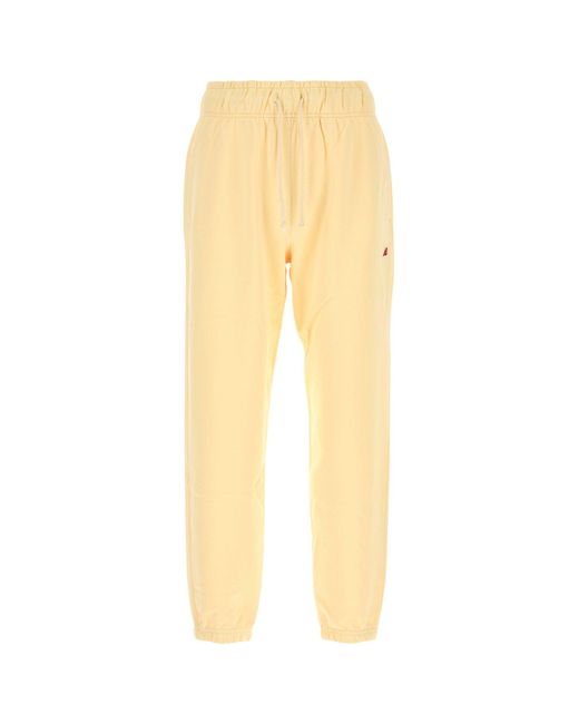 New Balance Pastel Yellow Cotton joggers for Men | Lyst UK
