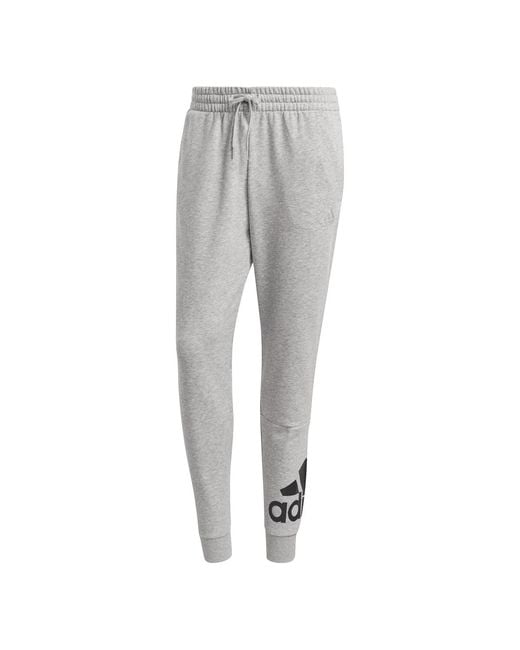 adidas Essentials French Terry Tapereed Cuff Logo Joggers in Grey for Men | Lyst UK