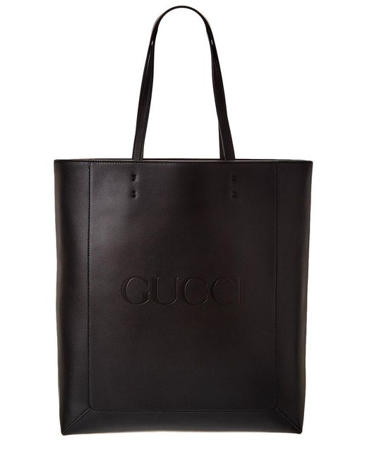 Gucci Logo Embossed Leather Tote in Black | Lyst