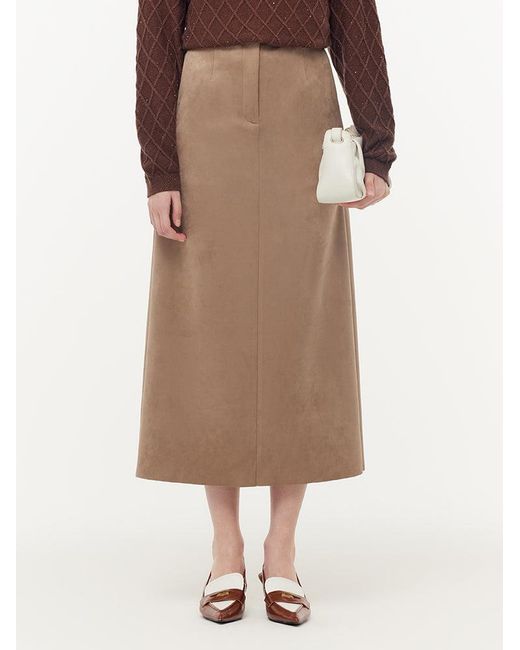 GOELIA Faux Suede Back Slit Midi Skirt in Natural | Lyst