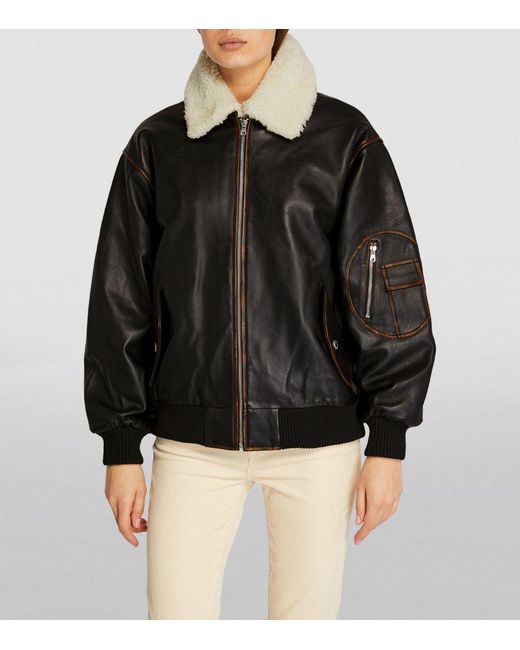Sandro Leather Shearling Bomber Jacket in Black | Lyst UK