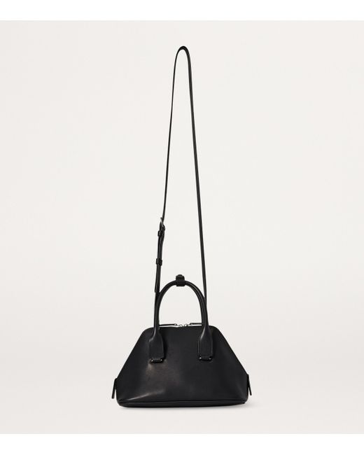 The Row Mini Devon Leather Cross-Body Bag in Black | Lyst