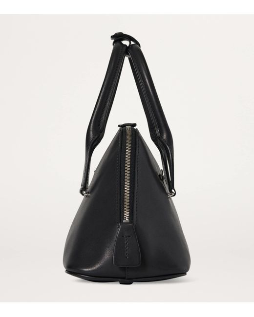 The Row Mini Devon Leather Cross-Body Bag in Black | Lyst